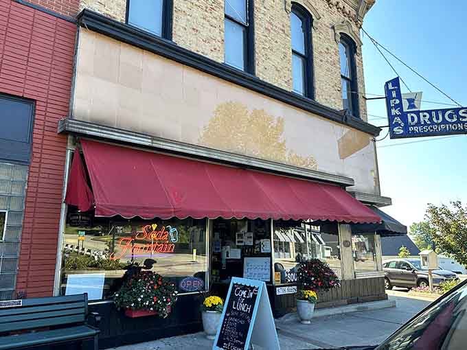 That red-and-cream awning isn't just decoration&mdash;it's a portal to an era when life moved slower and tasted sweeter.