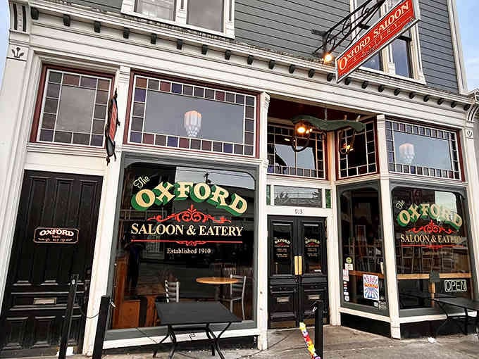 That classic storefront isn't just charming architecture&mdash;it's your portal to over a century of stories and spirits.