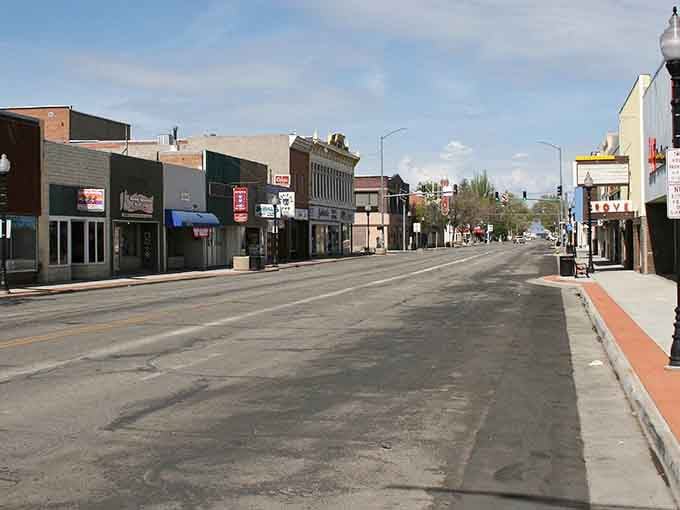 Main Street's historic buildings stand proud and practical, offering shade, shopping, and none of that pretentious boutique nonsense.