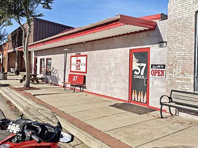 That red and white exterior isn't just charming, it's a beacon calling hungry travelers to salvation.