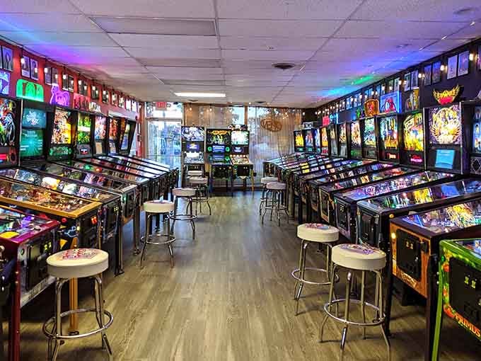 Rows of gleaming pinball machines stand ready like soldiers in the world's most entertaining army.