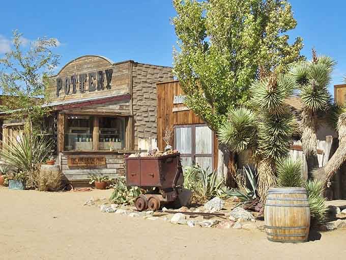 Desert authenticity meets Hollywood magic where weathered wood, Joshua trees, and rusty wagons create the perfect Western fantasy.