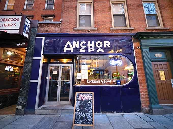 As evening falls, Anchor Spa's vintage storefront glows like a beacon for anyone seeking good food and better times.