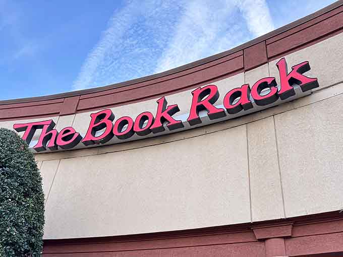 That bold red signage beckons book lovers like a lighthouse guides ships, promising literary adventures behind those welcoming glass doors.