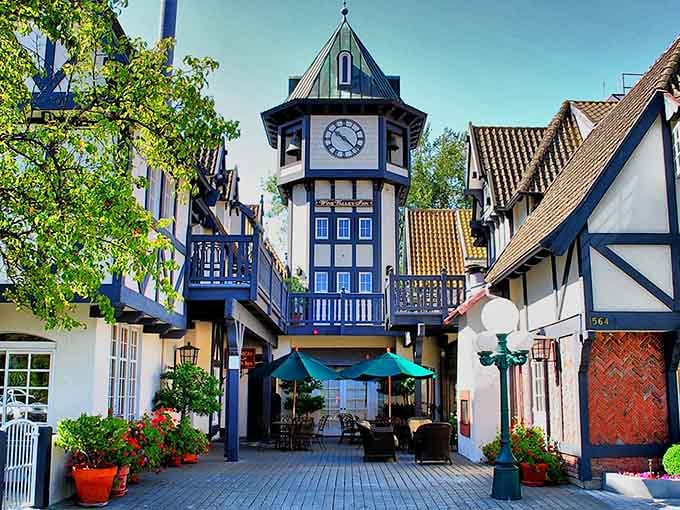 The iconic clock tower stands watch over a charming courtyard where Danish architecture meets California sunshine in perfect harmony.