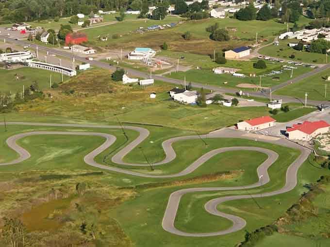From above, the track looks like someone drew the perfect racing circuit with sweeping curves that promise pure adrenaline-fueled joy.