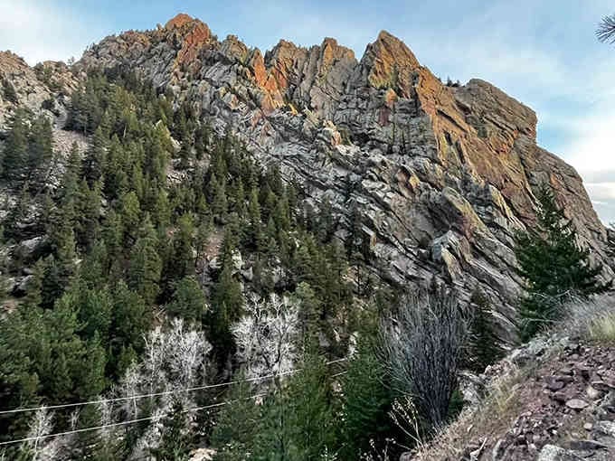 These towering rock formations have watched over the canyon longer than any of us have been complaining about our knees.