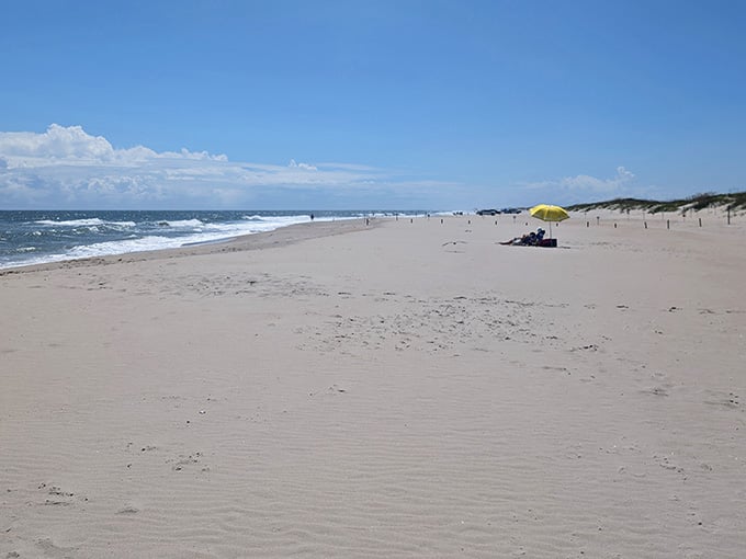 Miles of pristine sand stretch before you like nature's own welcome mat to paradise.