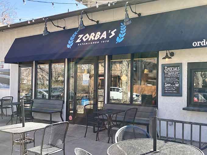 That signature blue awning isn't just for show, it's your beacon to Mediterranean bliss in the Denver neighborhood.