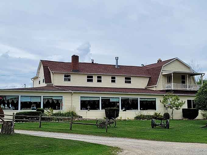 That classic cream-colored exterior with the burgundy roof isn't trying to impress anyone, and that's exactly why it works perfectly.