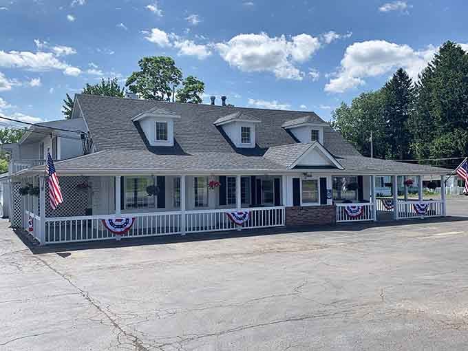 Patriotic bunting and timeless architecture signal you've found East Aurora's breakfast treasure hiding in plain sight.