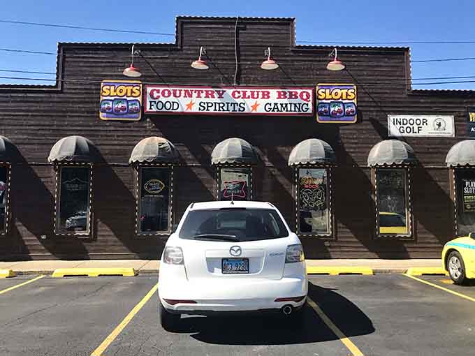 That wood-paneled exterior isn't trying to impress anyone, which is exactly why it impresses everyone who knows good barbecue.