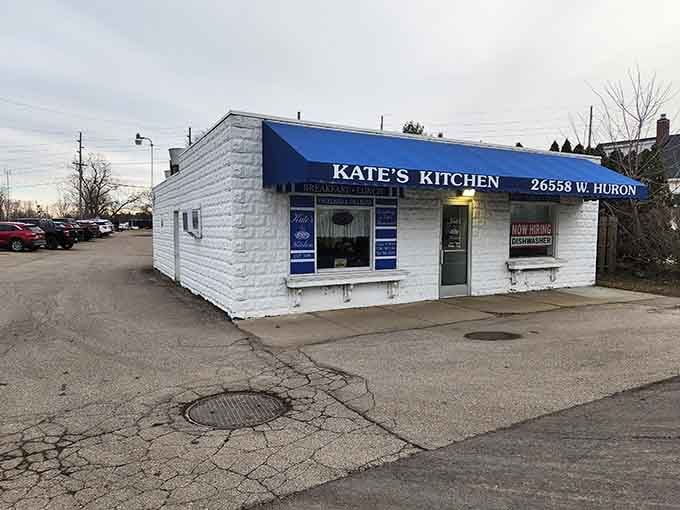 That cheerful blue awning on West Huron River Drive is your beacon to breakfast paradise in Flat Rock.