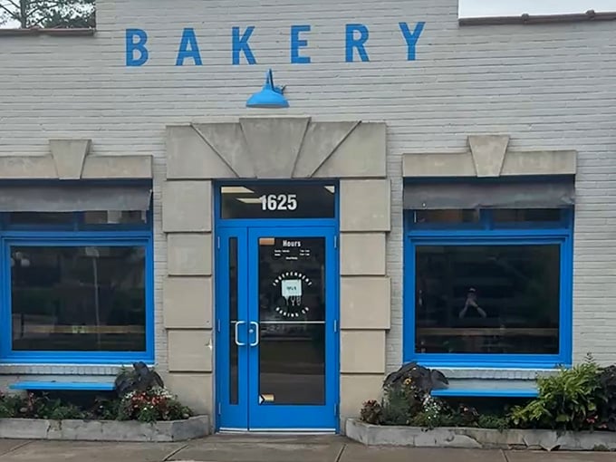 That bright blue "BAKERY" sign isn't just decoration; it's a beacon calling carb lovers home to happiness.