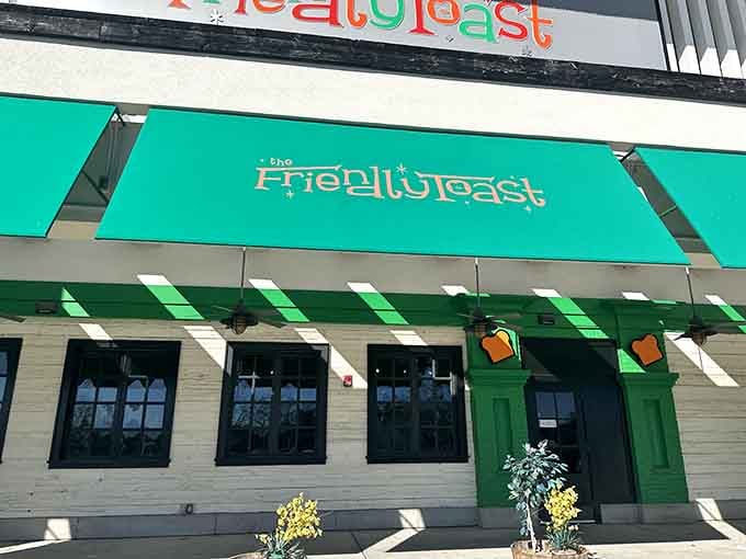 That cheerful green awning beckons like a beacon of breakfast hope in Chestnut Hill's landscape.