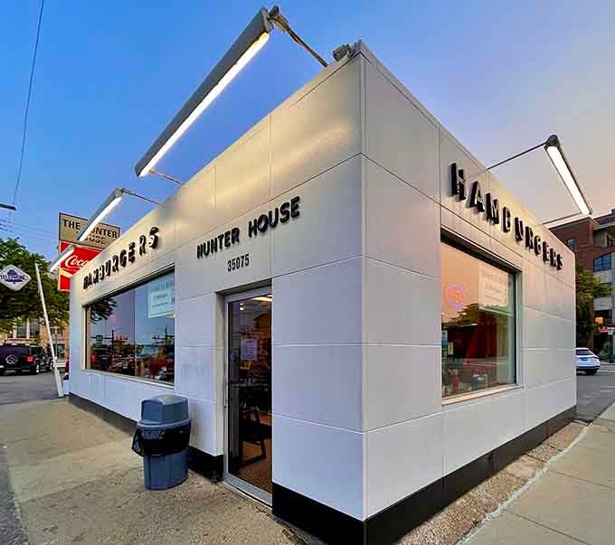 That gleaming white exterior isn't trying to impress anyone, just quietly serving burger perfection since forever.