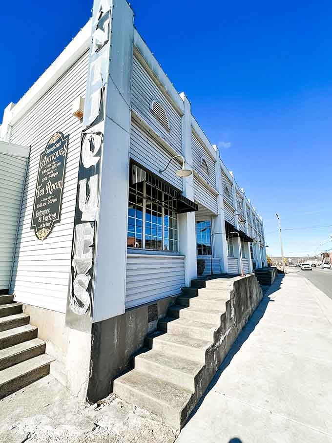That vintage "ANTIQUES" sign isn't lying - this charming building houses treasures both edible and decorative in downtown Ozark.