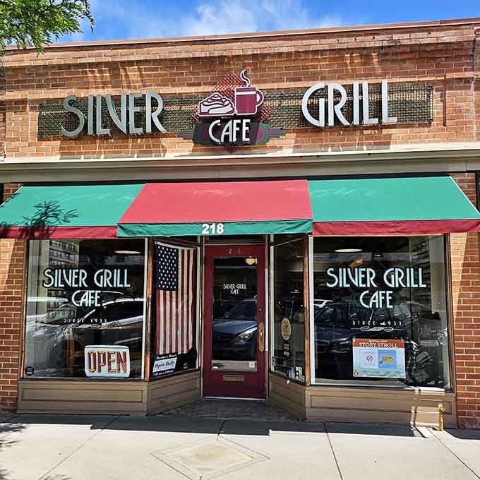 That colorful awning and vintage signage aren't just decoration; they're a time machine to breakfast's golden age.