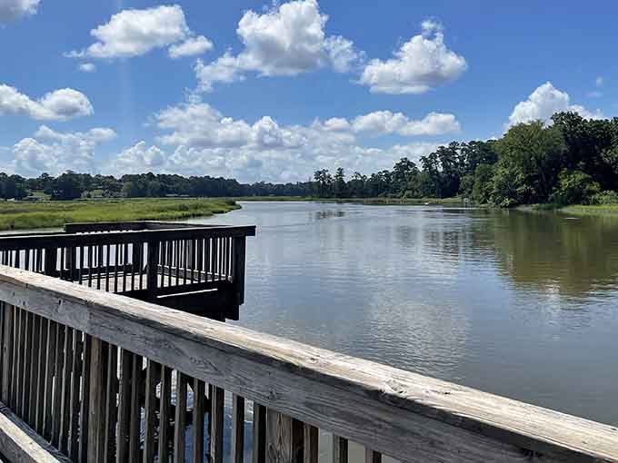 The Pagan River stretches out peacefully under those puffy clouds, proving that paradise doesn't require a passport or airport security.