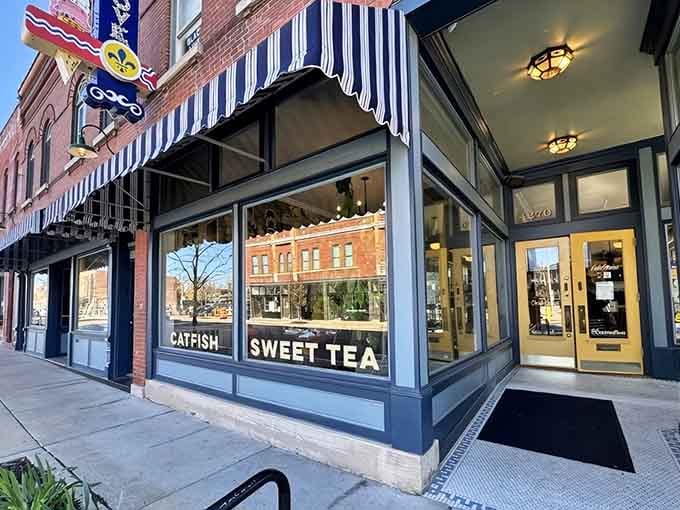 Those striped awnings aren't just for show; they're practically waving you inside for the chicken of your dreams.