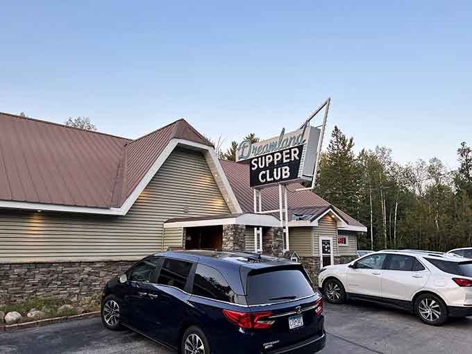 That vintage sign isn't trying to be retro, it's the real deal welcoming hungry souls to supper club paradise.