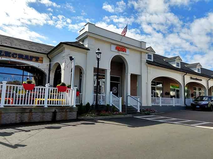 Those charming arches and white railings prove great noodles don't need a fancy address to shine.