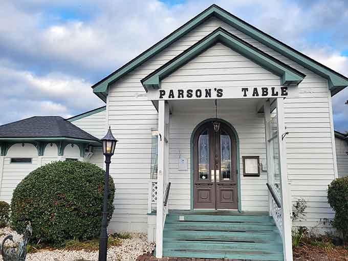 That charming white clapboard exterior isn't just pretty, it's your first clue that something special awaits inside.