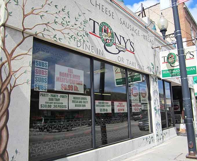 That storefront mural isn't just decoration; it's a promise of the carb-loaded, meat-stacked adventure waiting inside for you.