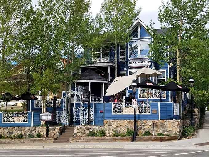 This charming blue Victorian house nestled in the aspens looks like something from a fairytale, but serves very real cake.