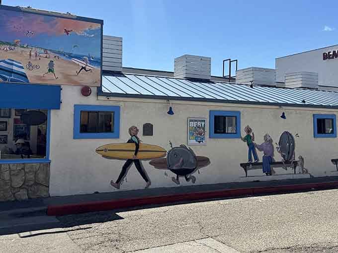 Those playful murals tell you everything: this place celebrates beach life, good food, and not taking yourself too seriously.