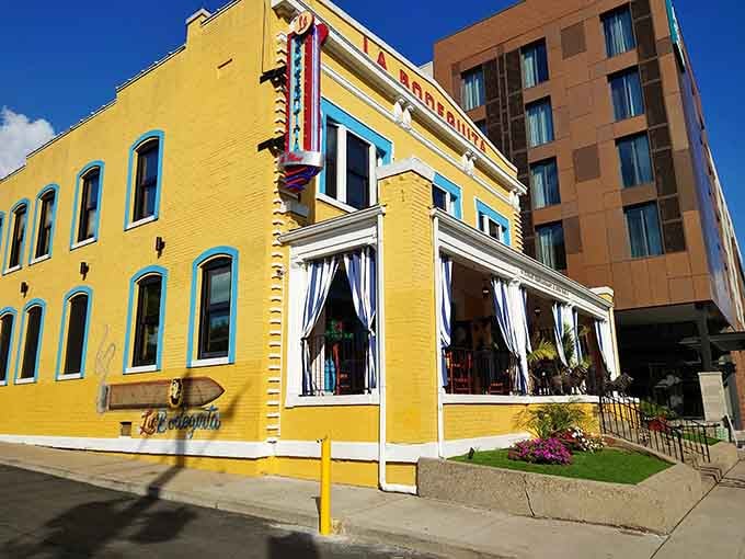 This sunshine-yellow building stands out like a slice of Havana dropped onto a Louisville street corner, impossible to miss.