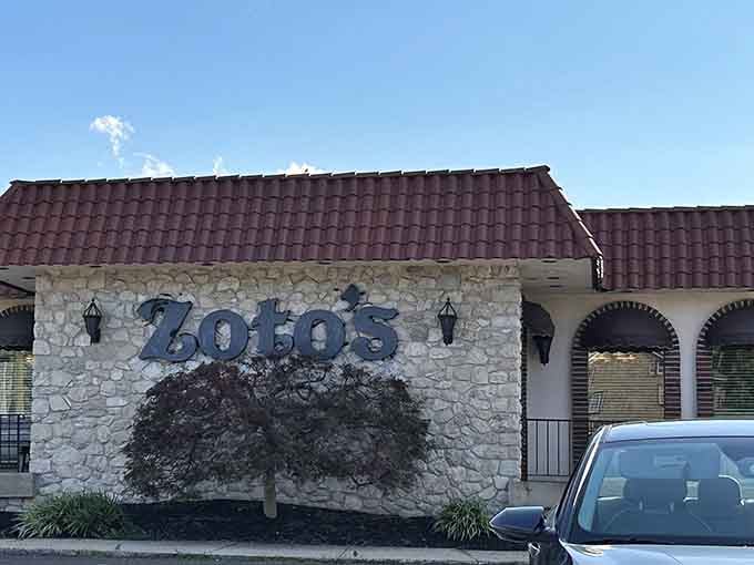 That charming stone facade with the classic lettering promises comfort food and good times ahead.