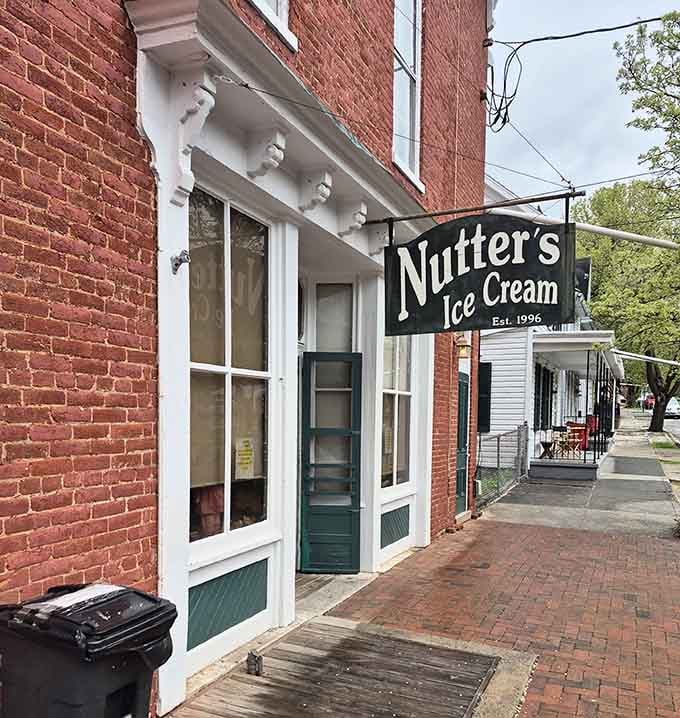 That classic storefront on Main Street isn't selling insurance or antiques, it's dispensing pure summer joy in scoopable form.