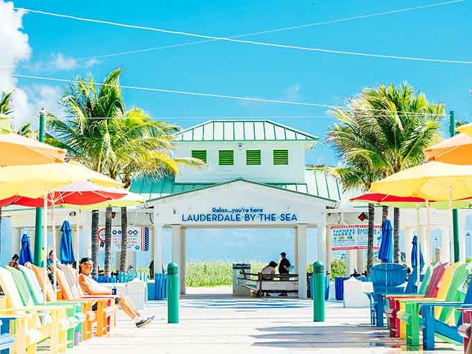 Those colorful Adirondack chairs aren't just Instagram bait; they're your front-row seats to paradise and relaxation.