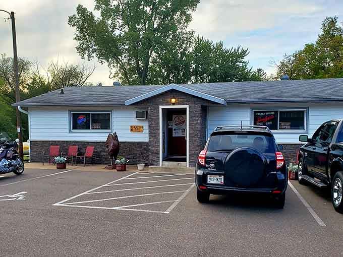 That blue exterior might be modest, but inside waits chicken wing glory that'll make you a regular.