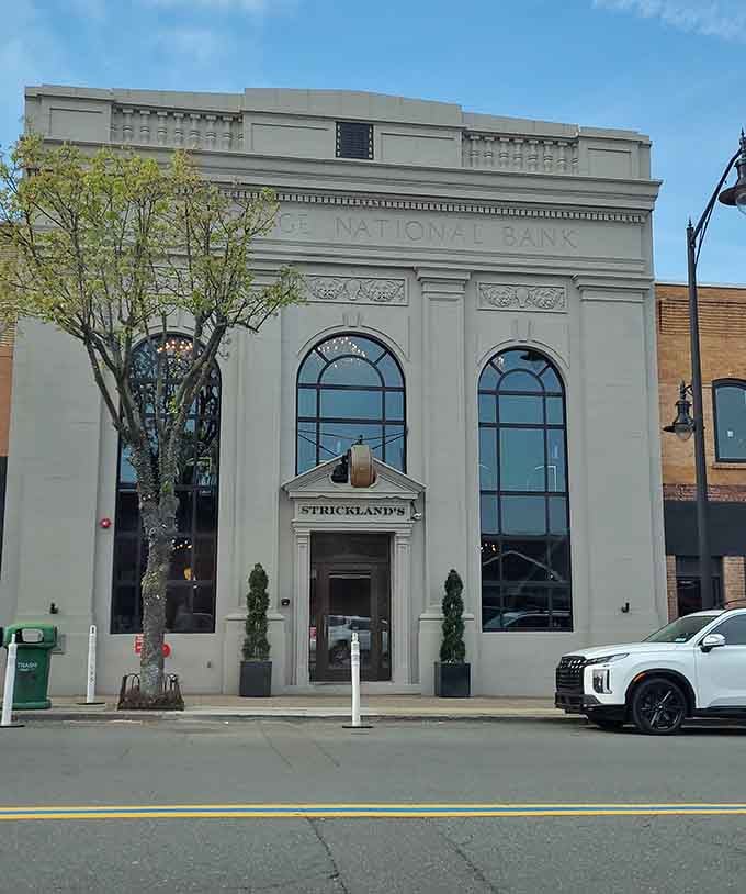 That former bank facade now guards something far more valuable than money: perfectly aged beef and unforgettable meals.