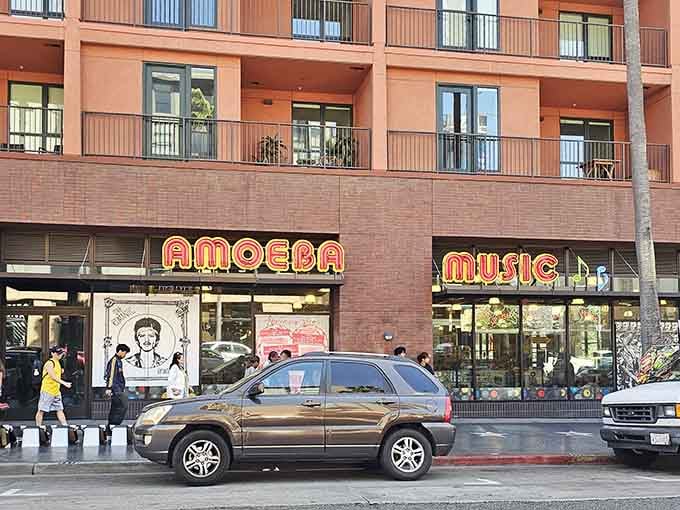 The storefront windows display upcoming shows and events, turning a simple music store into a community hub where live performances actually happen.