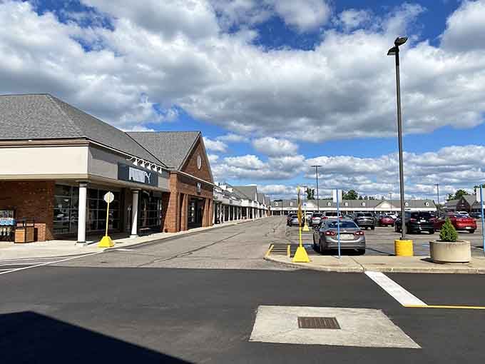 Those dramatic clouds overhead make even outlet shopping feel like an adventure worth documenting for the grandkids.