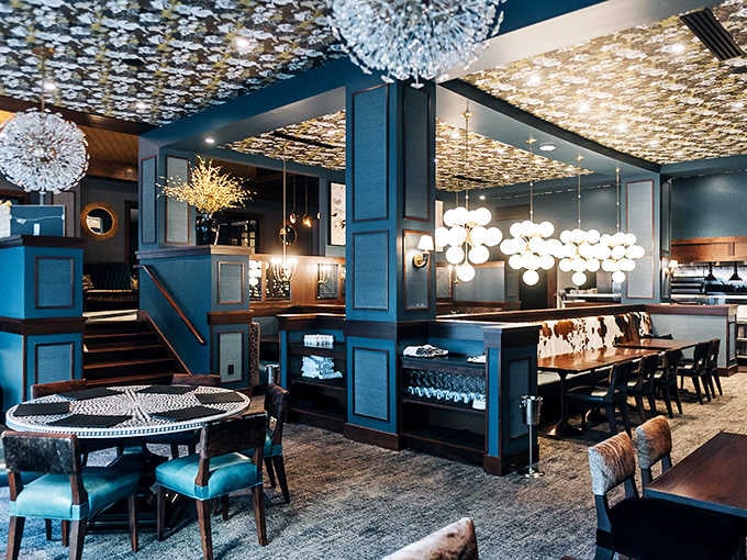 Elegant dining rooms with artistic chandeliers set the stage for an unforgettable evening of exceptional steaks.