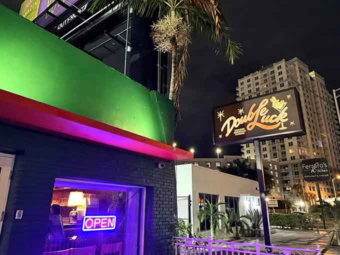 That retro-futuristic sign glowing against the Miami night sky is your beacon to Chinese-American fusion paradise.
