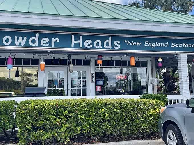 That cheerful signage and colorful buoy collection outside promises New England authenticity in the most unlikely Florida location.
