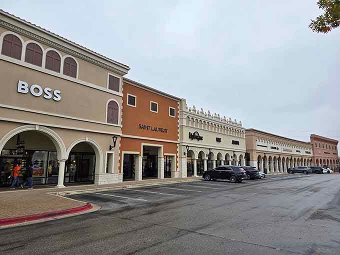 Those elegant arches aren't just for show, they're shading your path to designer deals and retail redemption.