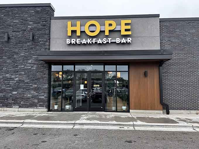 That golden signage against modern stonework tells you this isn't your grandmother's diner, though she'd absolutely love it here.