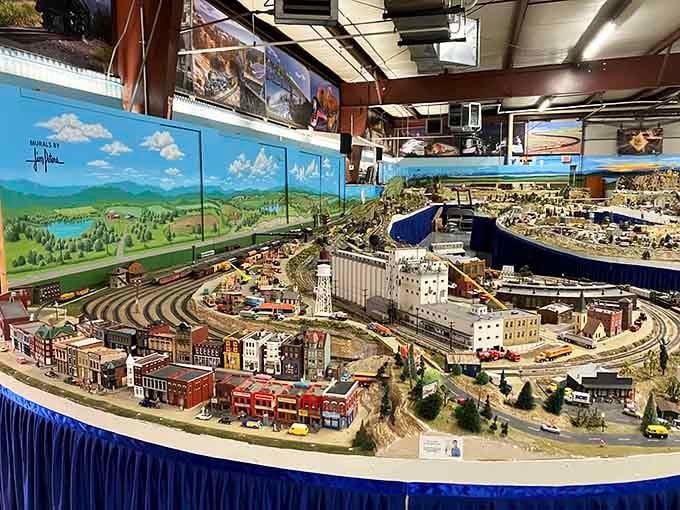 Sweeping curves of track wind through a miniature downtown that captures small-town America with breathtaking precision and artistry.
