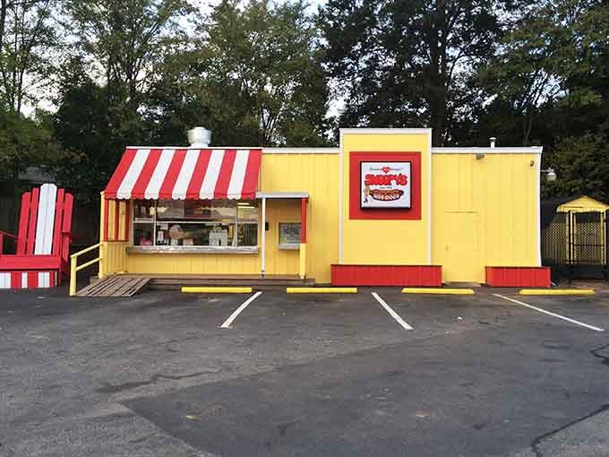 That cheerful yellow building with the red-striped awning isn't a mirage, it's your wallet's new best friend.