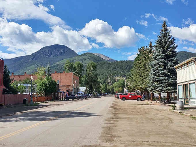 Majestic peaks frame Lake City's downtown, where authentic Victorian-era architecture meets small-town charm in the heart of the San Juans.