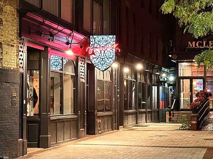 Behind that elegant black facade with its brass fixtures lies a dining experience that'll make you forget you're in the 21st century.