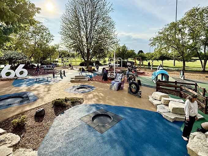 The playground sprawls across the grounds like a kid's fever dream made real, complete with Route 66 nostalgia.