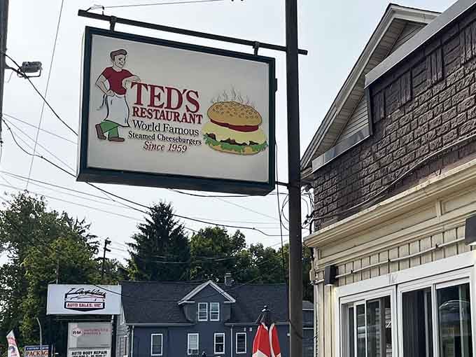 That sign doesn't lie: world famous steamed cheeseburgers have been drawing pilgrims to this spot since Eisenhower was president.