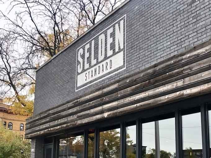 That sleek dark brick facade isn't just good looks, it's a promise of the culinary excellence waiting inside.